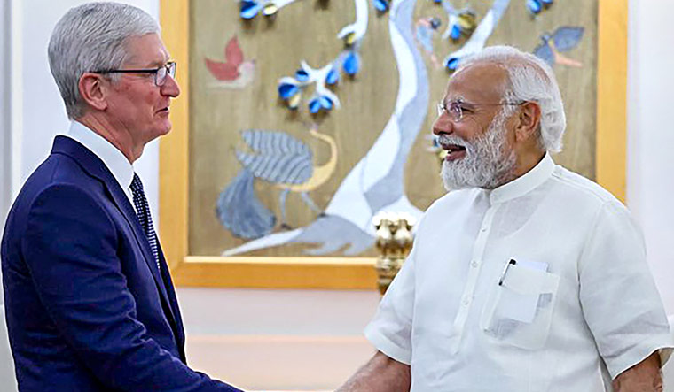 Apple CEO Tim Cook meets Modi; says committed to growing, investing ...