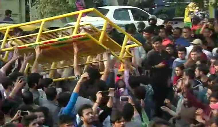 JNU students stage massive protest against 300% fee hike, dress code ...