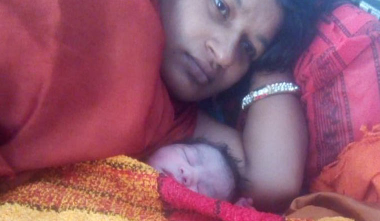 Migrant worker's wife delivers baby onboard Shramik special train- The Week