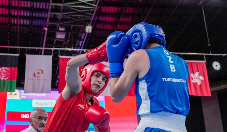 Asian Games boxing: Parveen Hooda seals Paris Olympic berth with medal ...