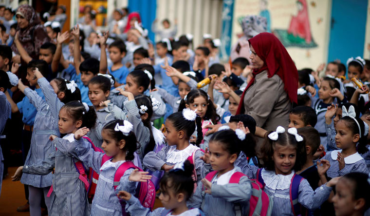 Trump stops aid to 'flawed' UN Palestinian refugee agency- The Week