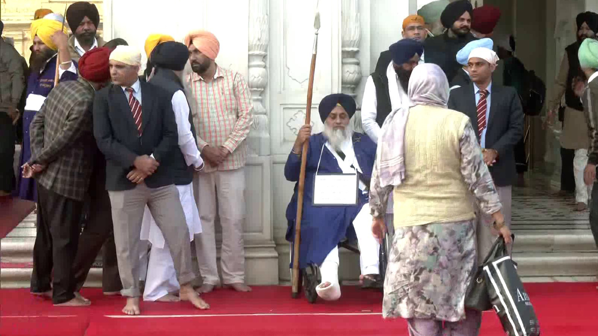 With plaque around his neck, former Punjab CM Sukhbir Singh Badal serves punishment at the ...